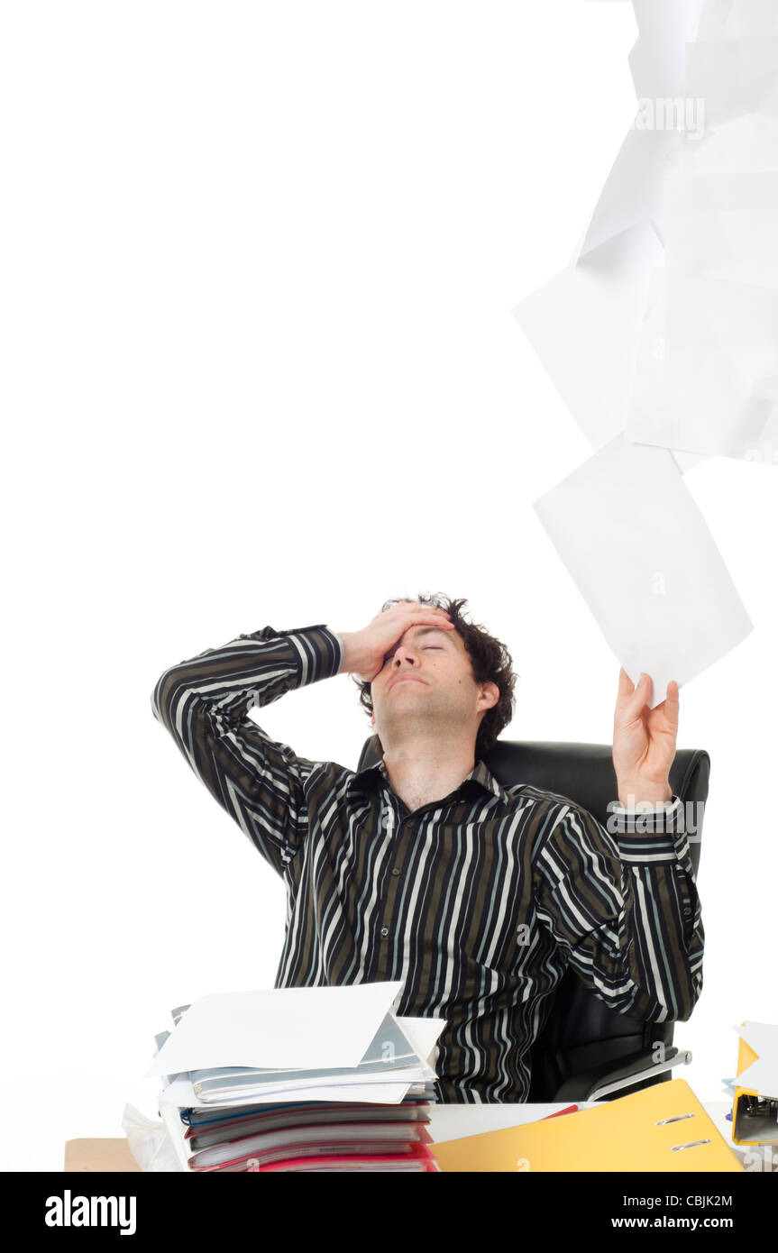 Man stressed doing paper work Stock Photo - Alamy