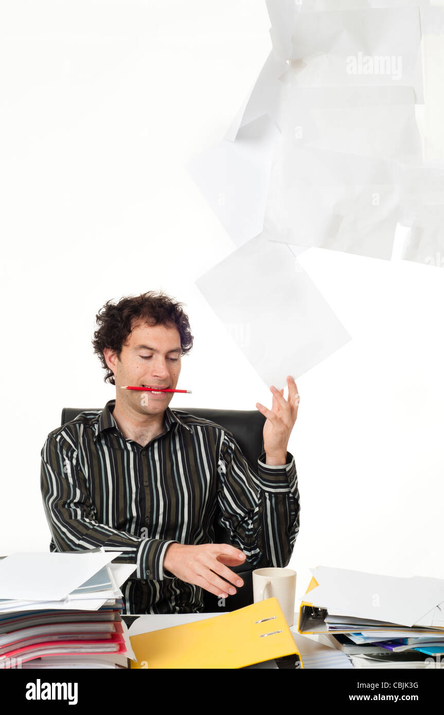 Man stressed doing paper work Stock Photo - Alamy