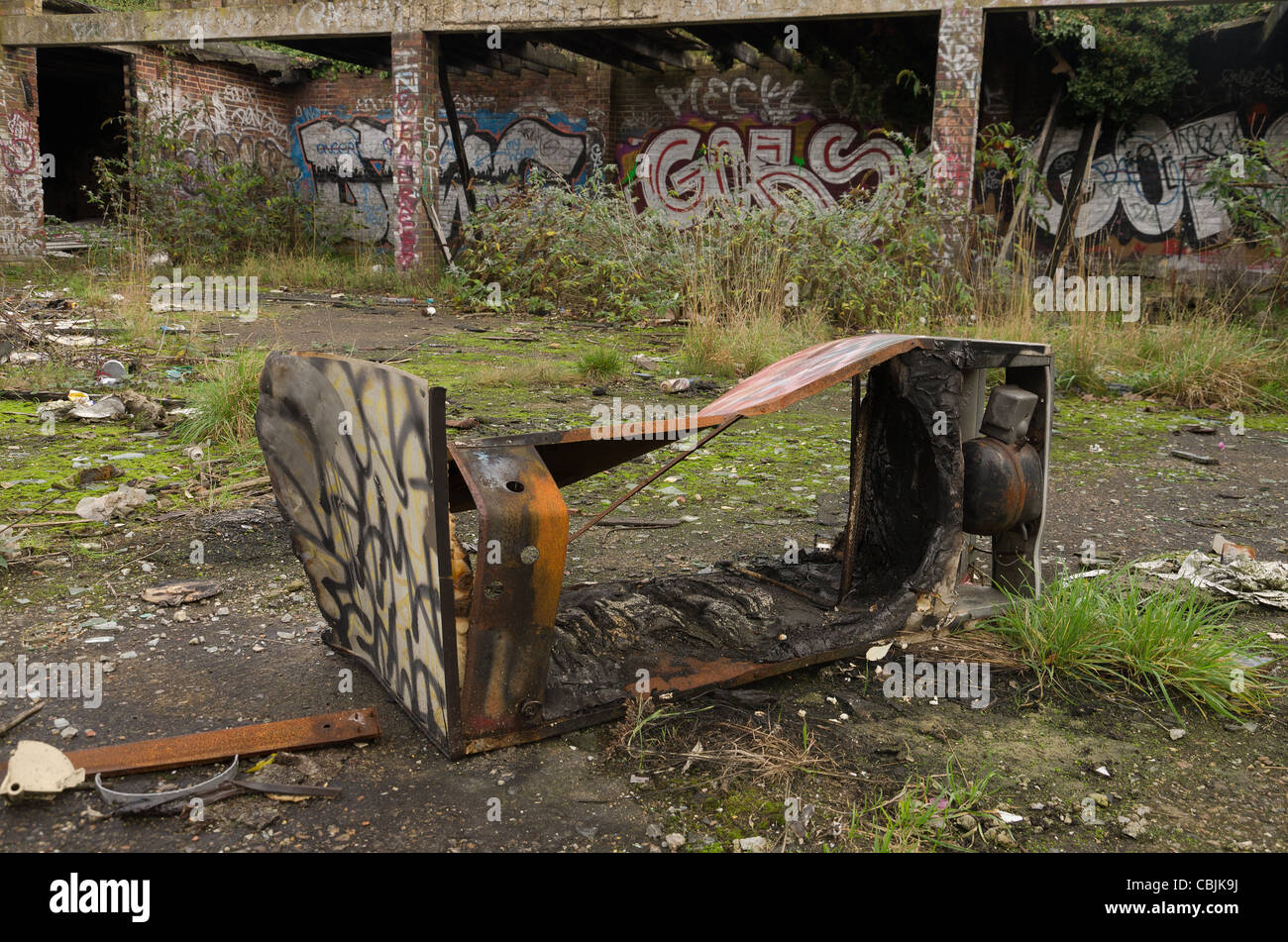 Remains of burnt out fridge now rusting in vandalized primary school ...