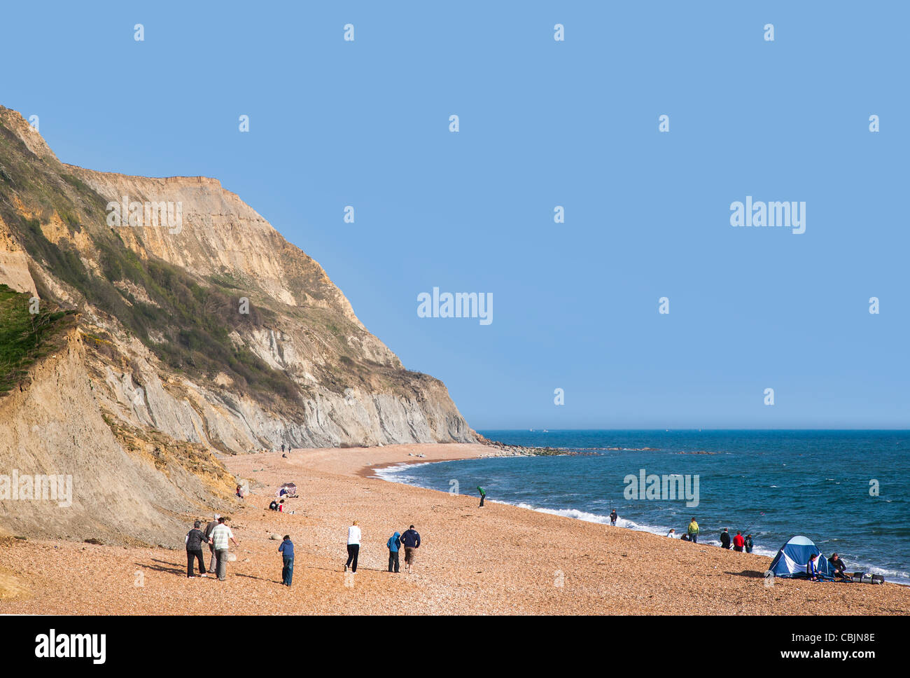 People on the beach in summer at Charmouth, Dorset, England Stock Photo ...