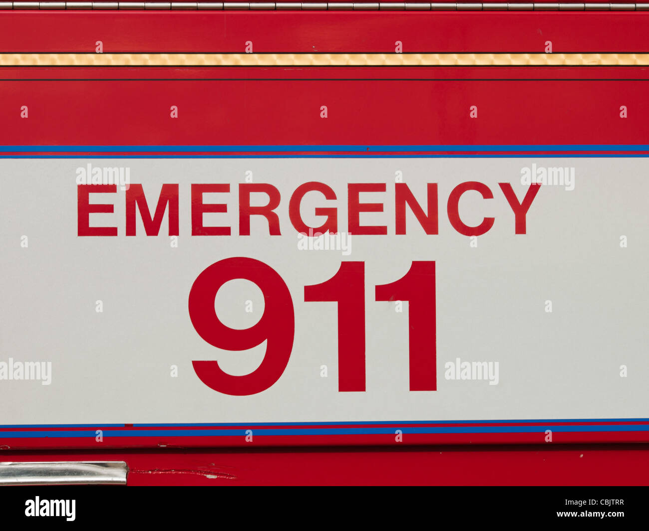 Emergency sign on side of the fire truck Stock Photo - Alamy