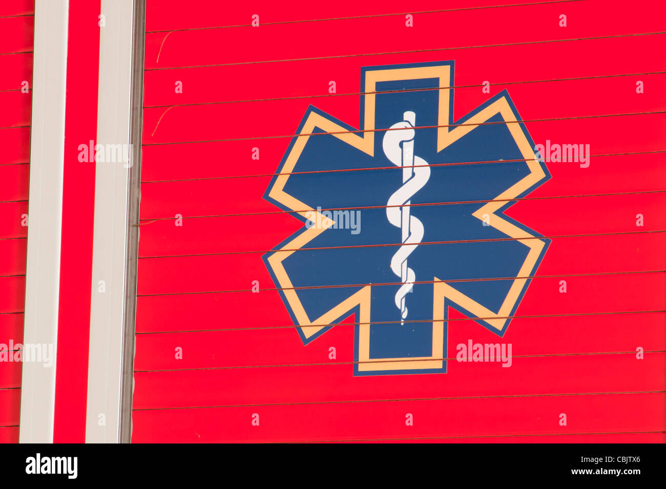 Emergency sign on side of the fire truck Stock Photo - Alamy