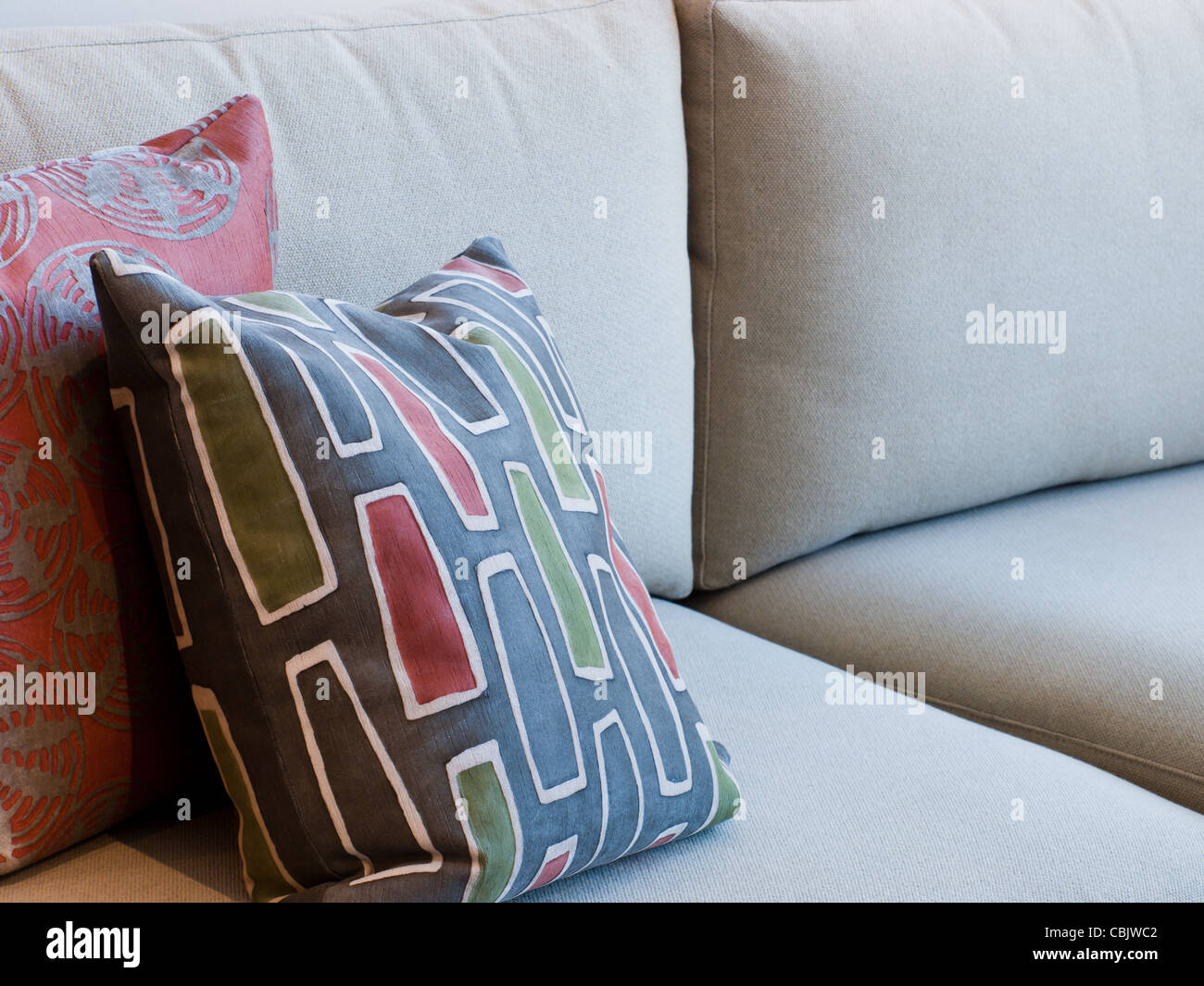 Color pillows on sofa Stock Photo - Alamy