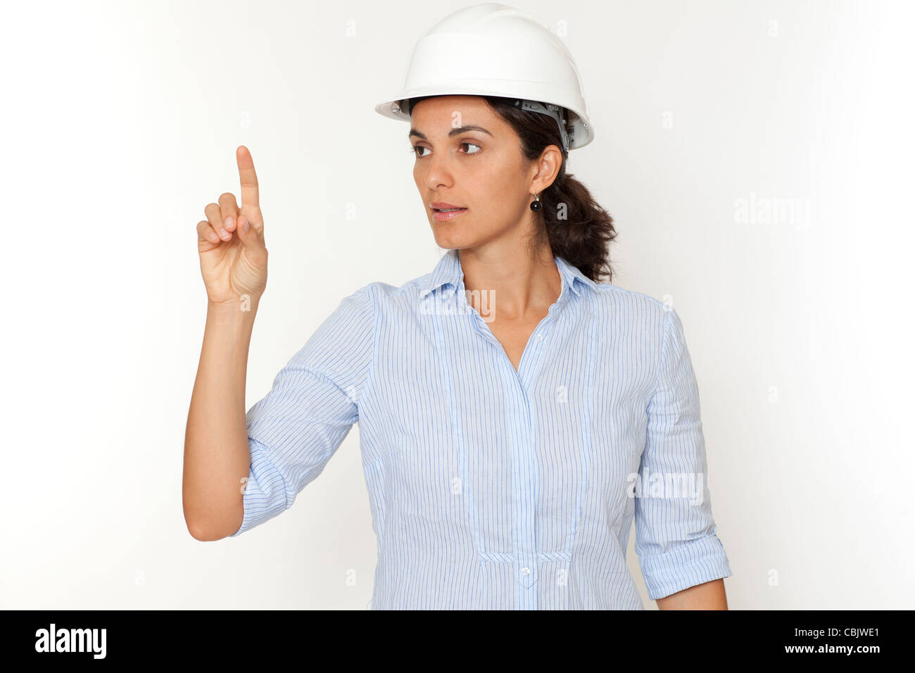 Female engineer pointing on virtual screen Stock Photo - Alamy