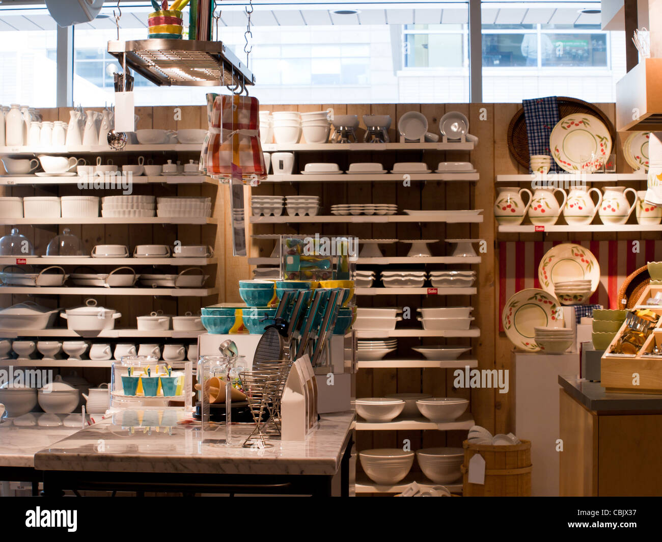 Variety of dishware on the display at the store Stock Photo - Alamy