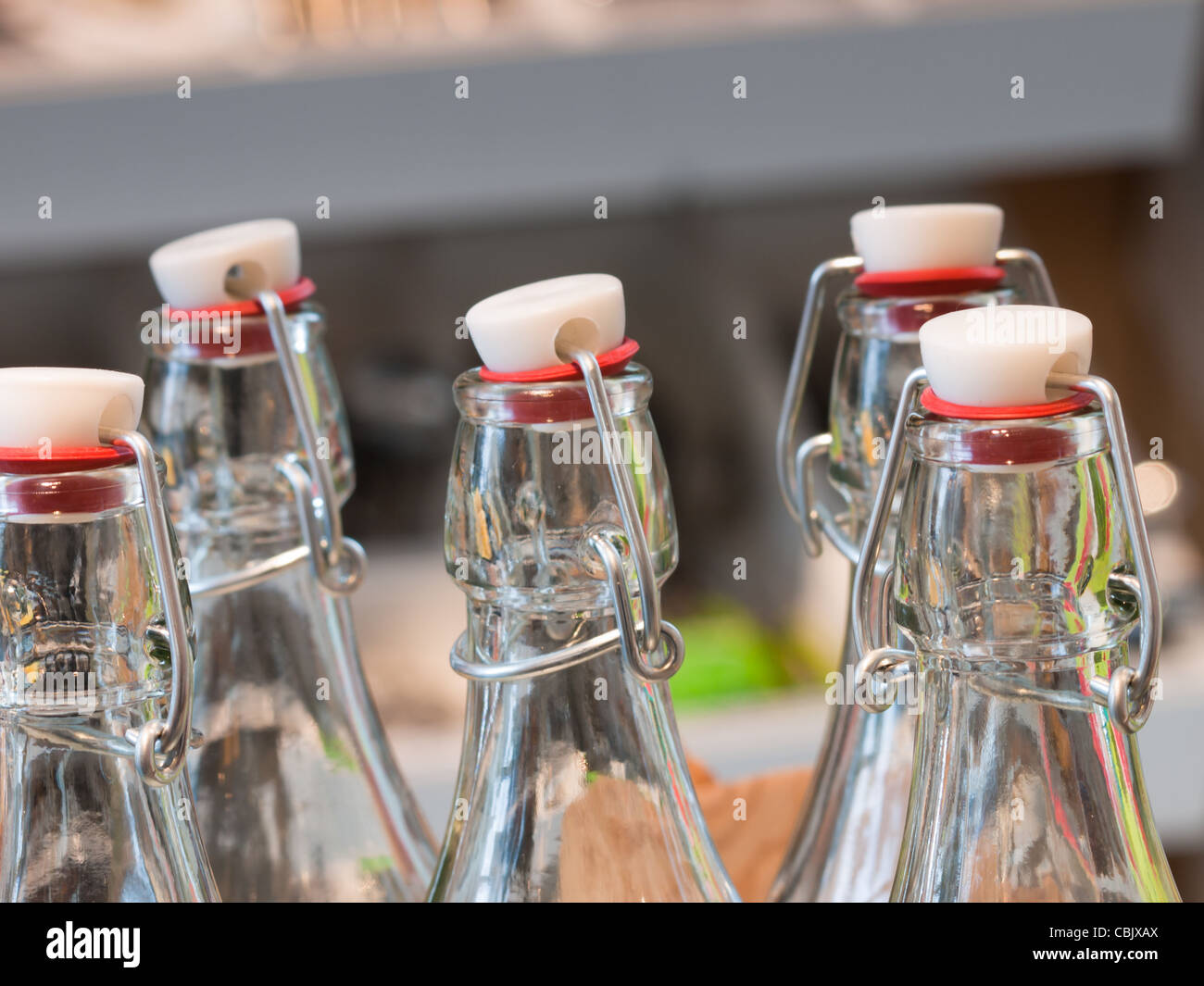Glass bottles with red and white cap Stock Photo - Alamy