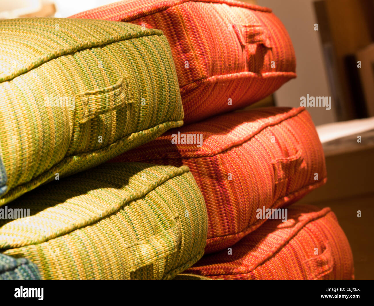 Different color seat cushions on display Stock Photo - Alamy