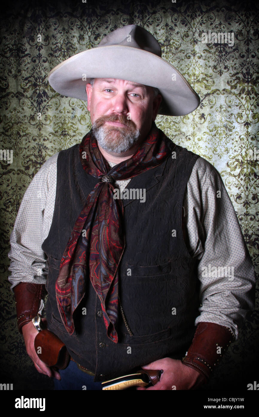 A vintage upset looking cowboy Stock Photo - Alamy