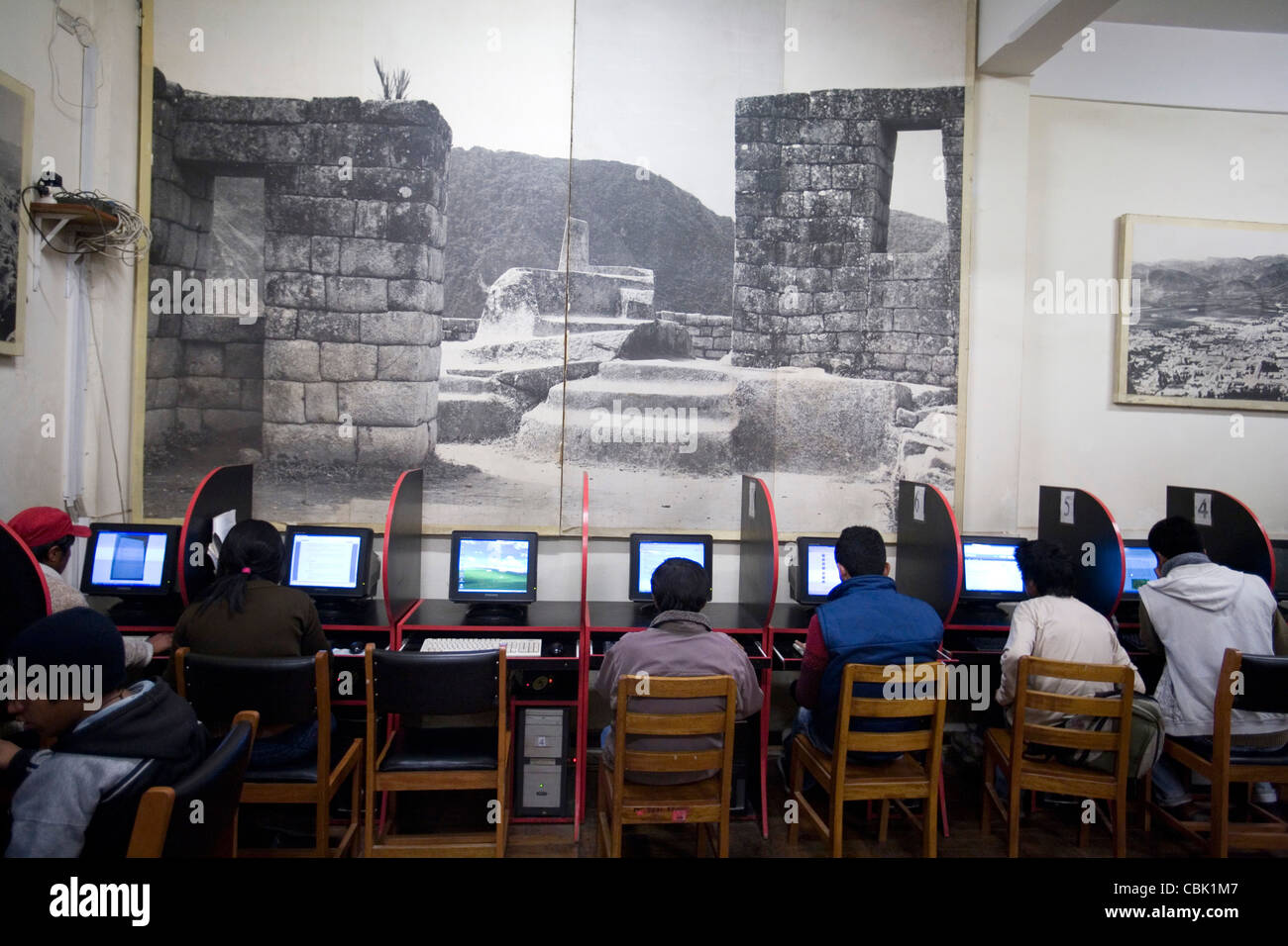 Youth using computers and Internet connection at public library Cusco ...