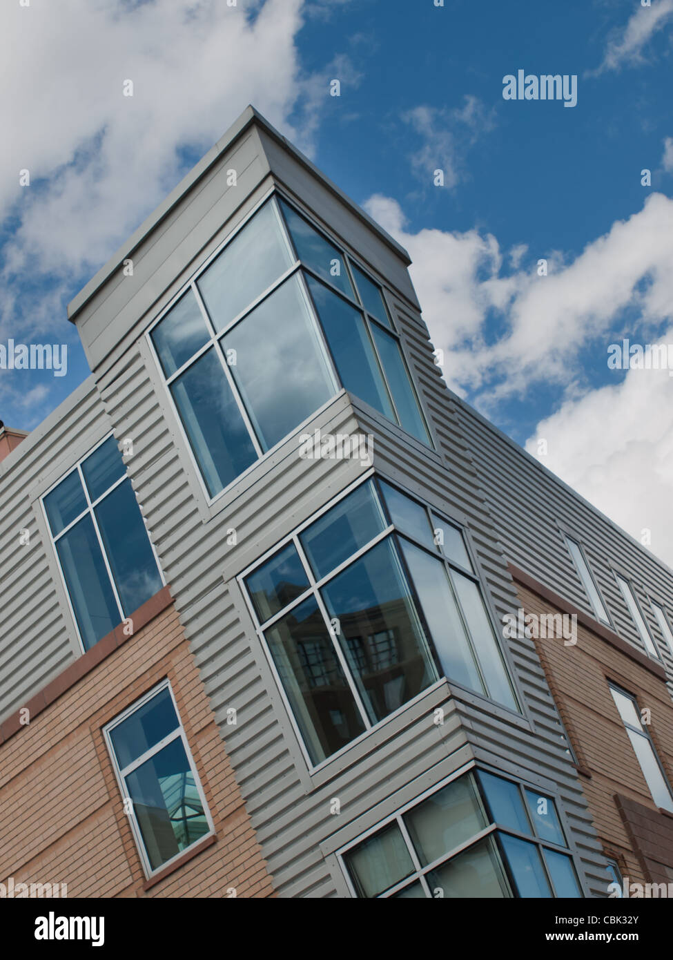 A modern condo building with an unusual shaped corner in Denver ...