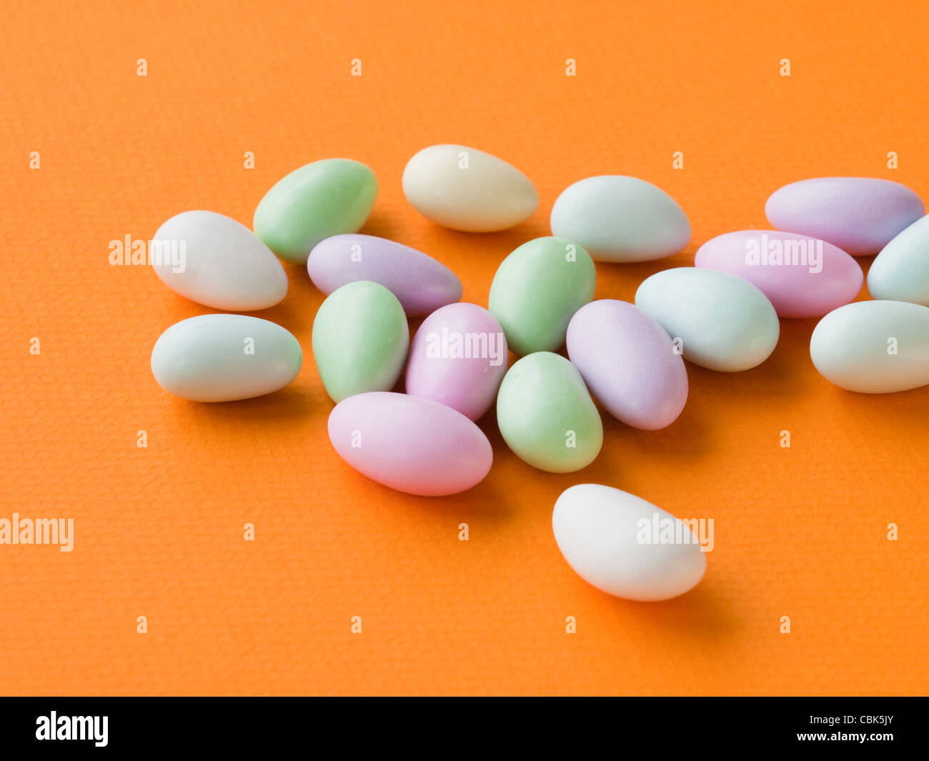 Easter candies in yellow bowl Stock Photo - Alamy