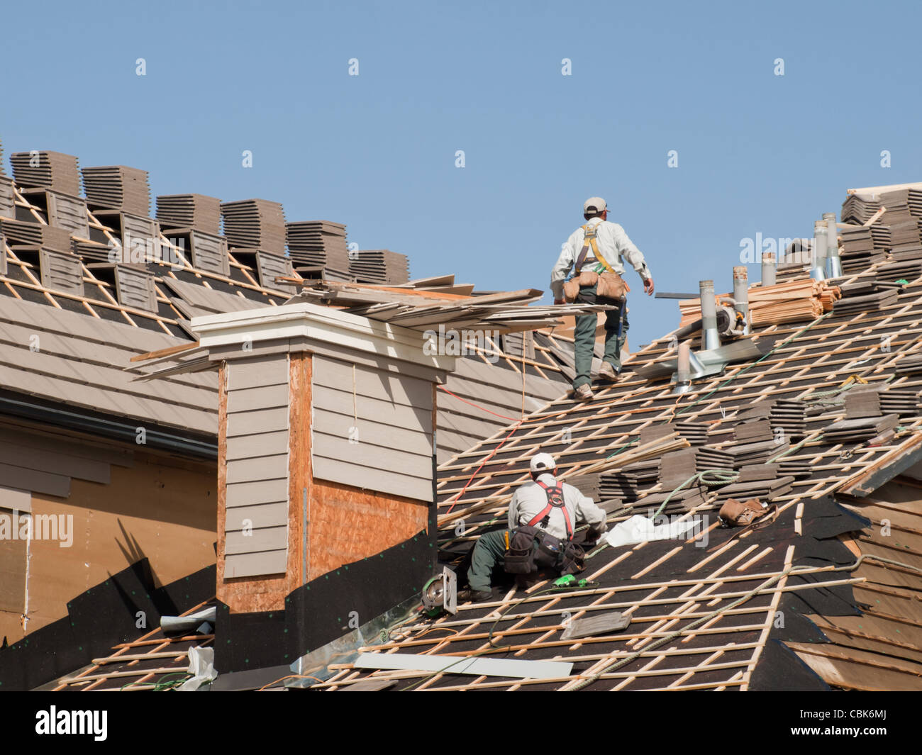 Roof repairs of an apartment building in Colorado Stock Photo - Alamy