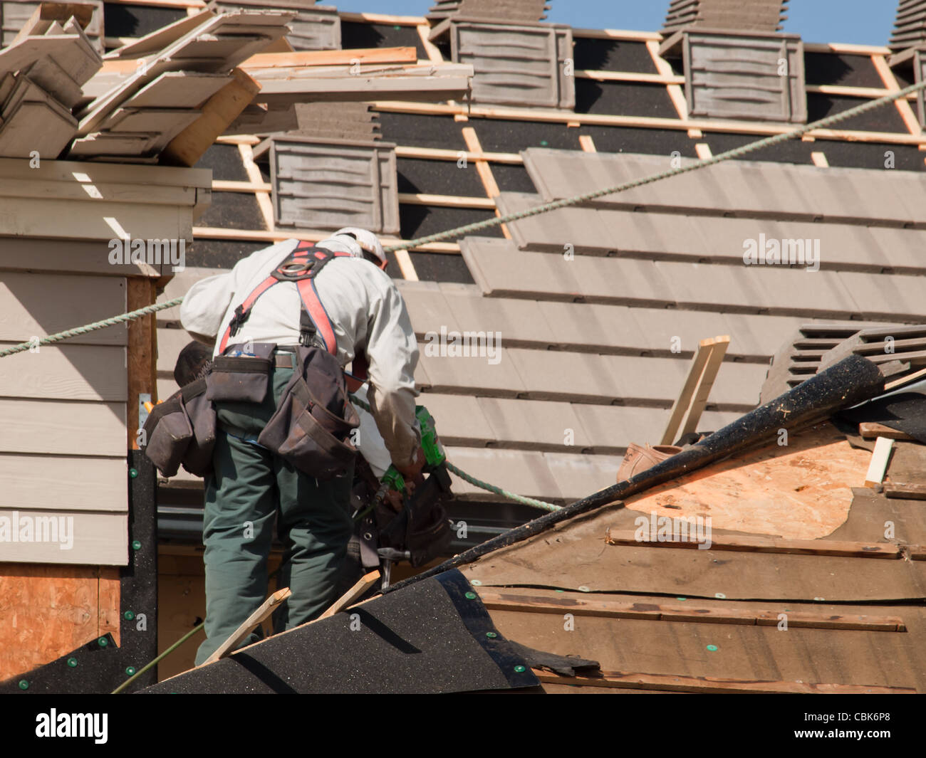 Roof repairs of an apartment building in Colorado Stock Photo - Alamy