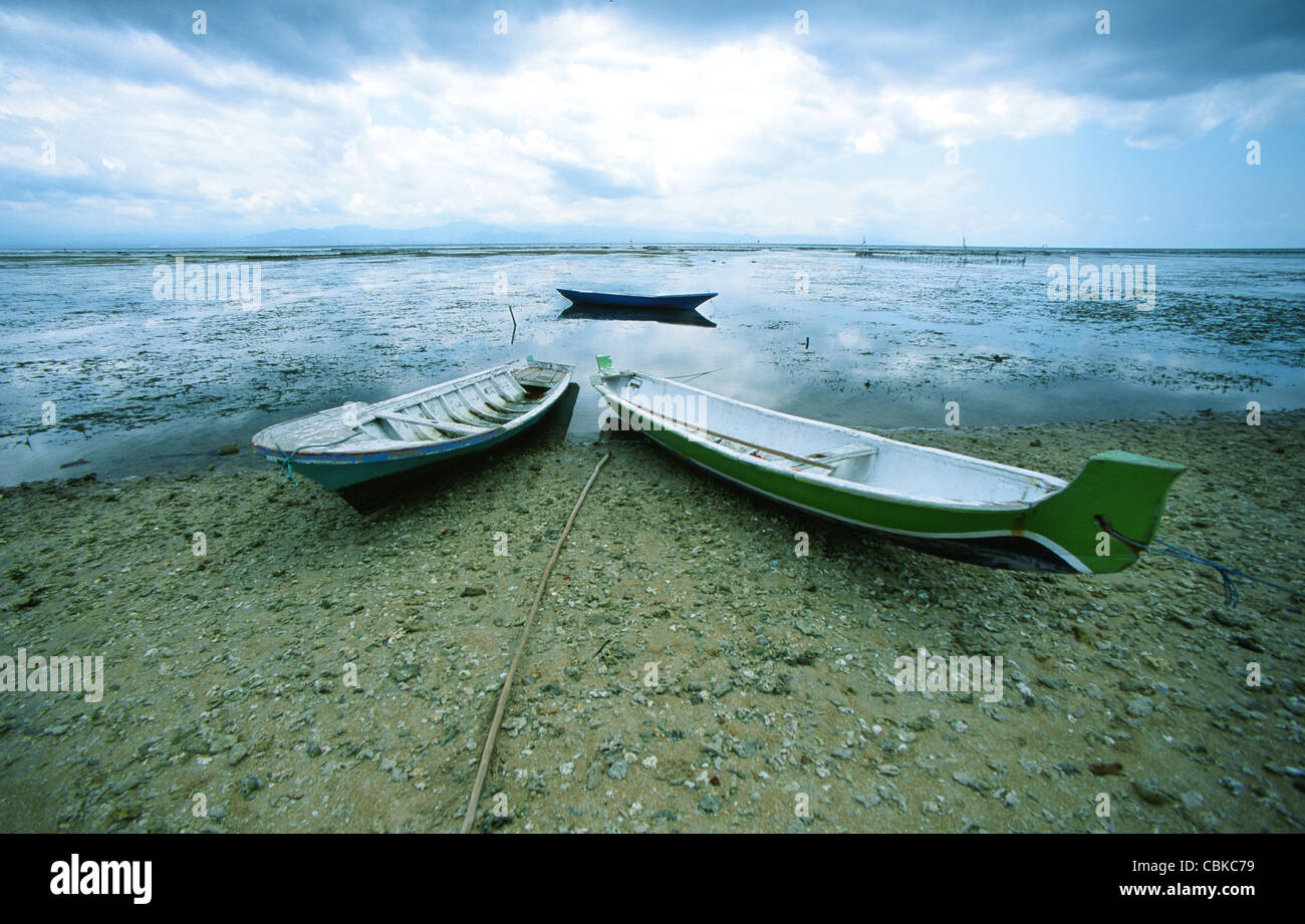 wood boat of seaweed farmer at the Indonesian island of Nusa Lembongan ...