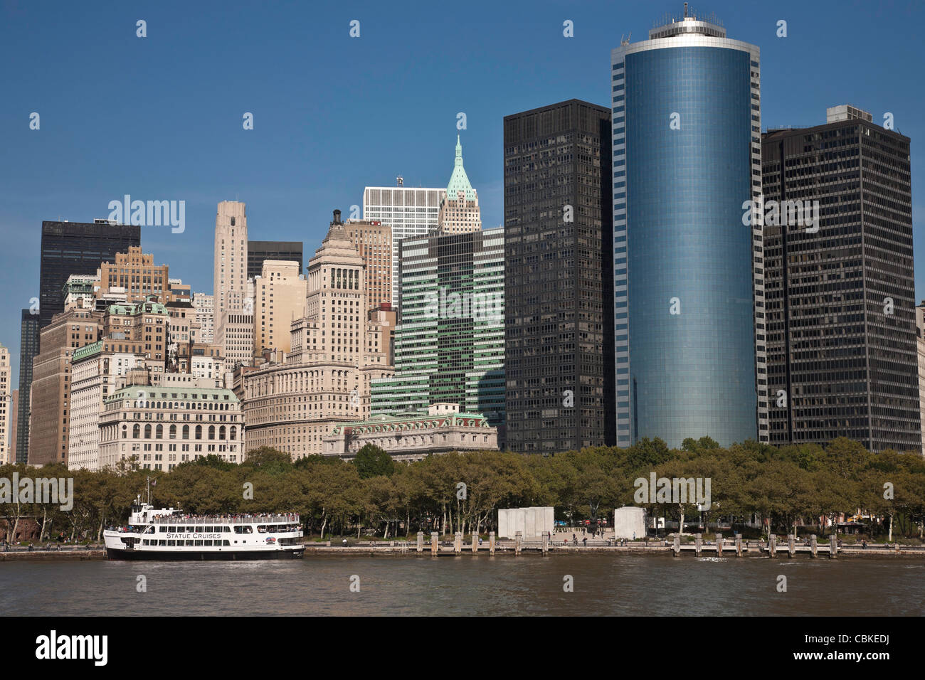 Battery Park , Ferry with Financial District Skyline in Background, NYC ...