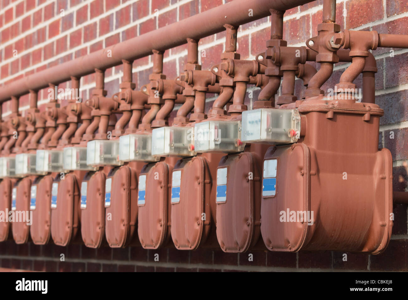 Water meters on the wall of apartment building Stock Photo - Alamy
