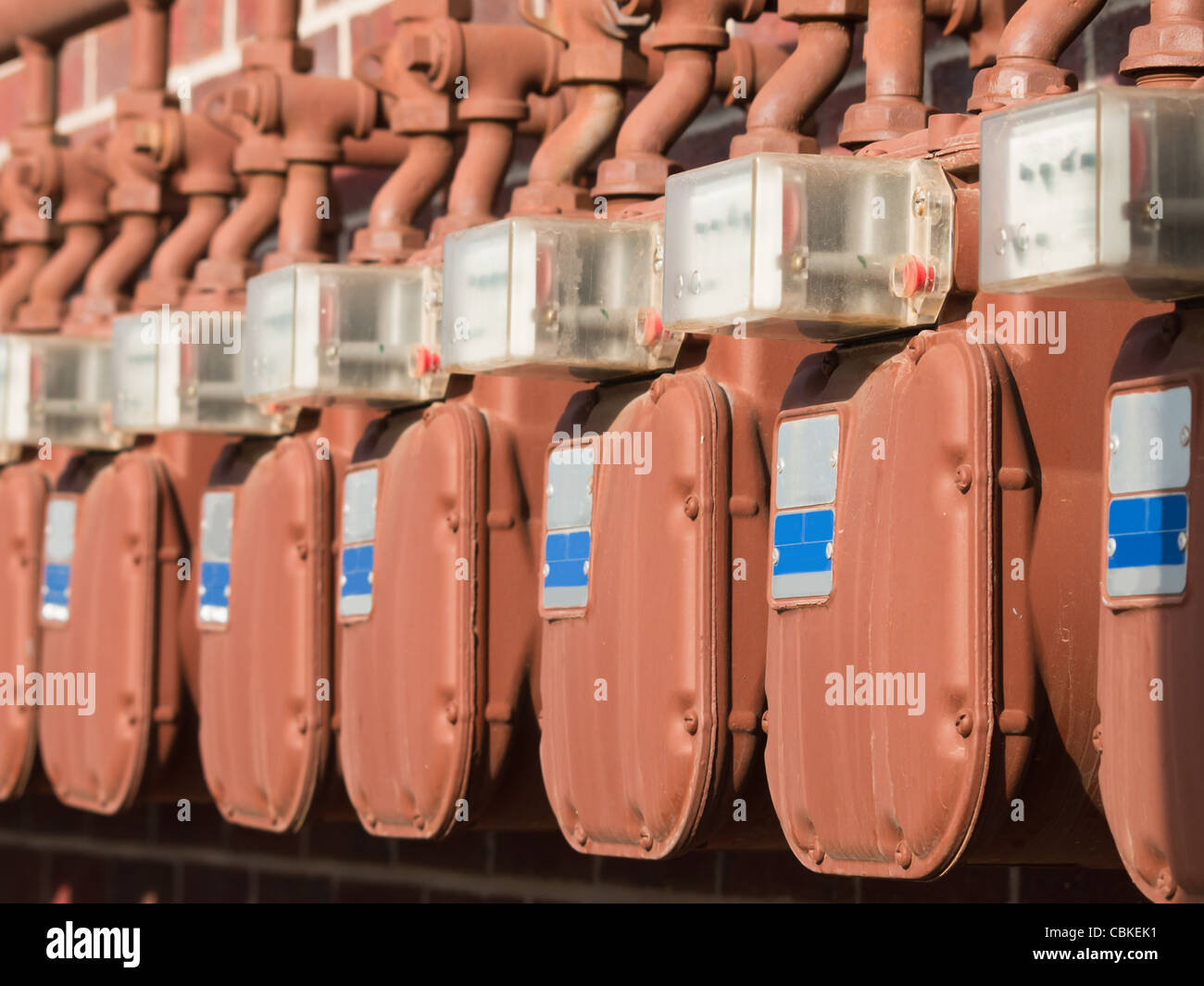 Water meters on the wall of apartment building Stock Photo - Alamy