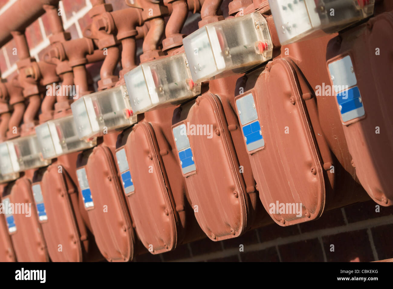 Water meters on the wall of apartment building Stock Photo - Alamy