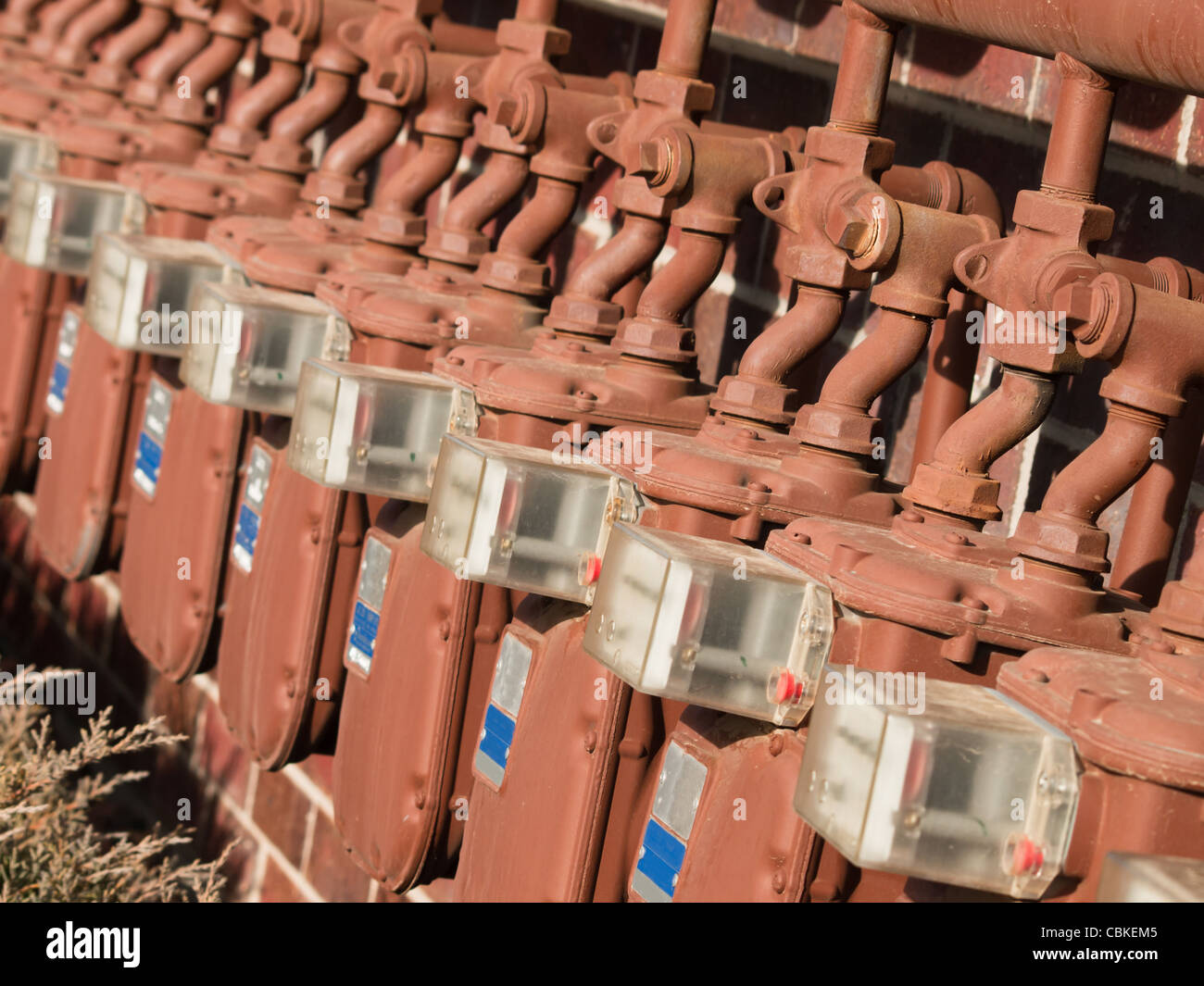 Water meters on the wall of apartment building Stock Photo - Alamy