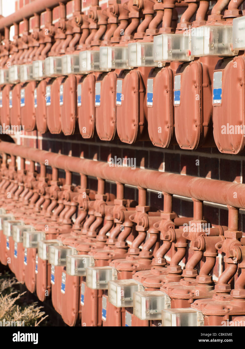 Water meters on the wall of apartment building Stock Photo - Alamy