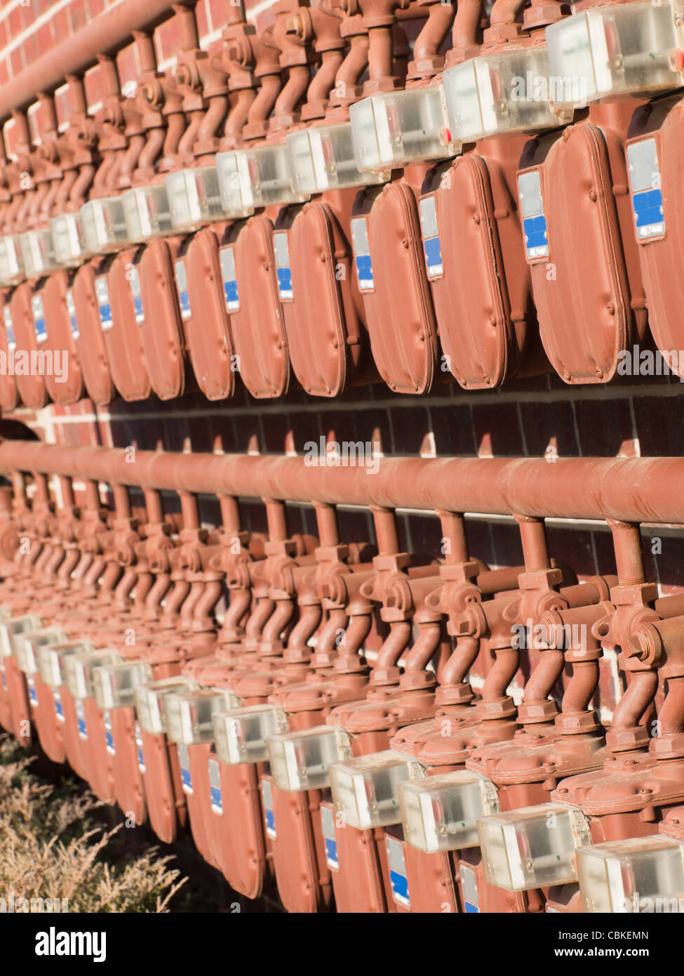 Water meters on the wall of apartment building Stock Photo - Alamy