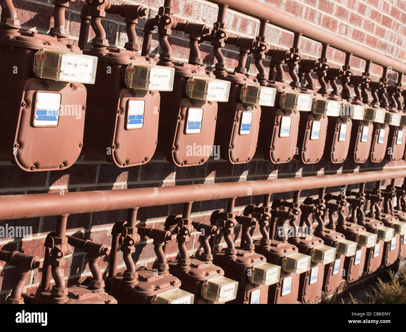 Water meters on the wall of apartment building Stock Photo - Alamy