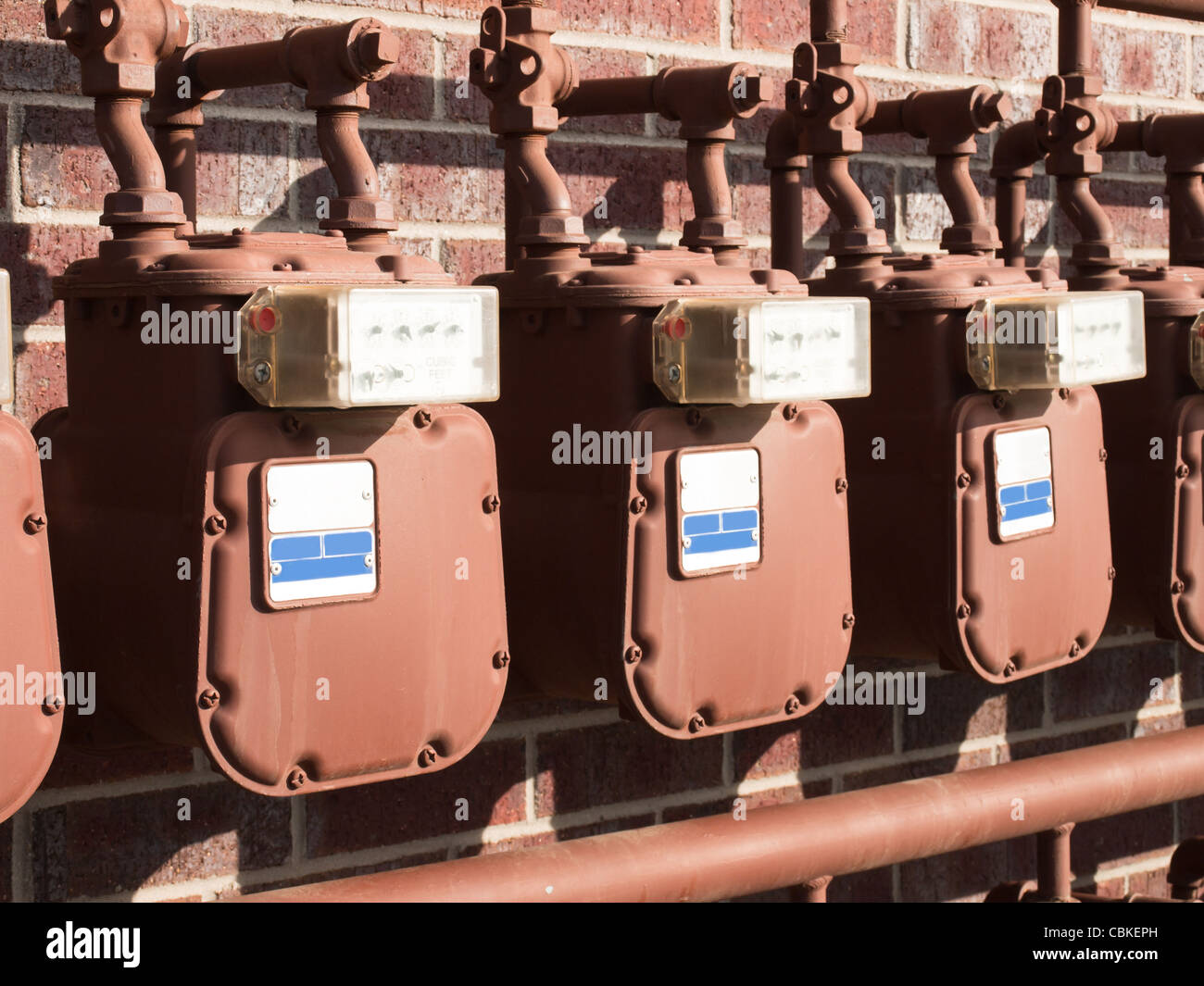 Water meters on the wall of apartment building Stock Photo - Alamy