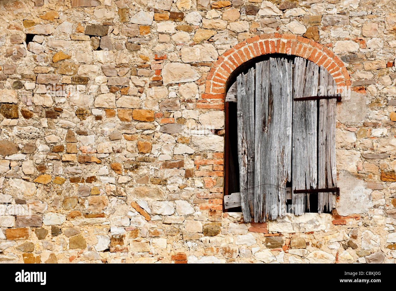 Rustic wall and decaying window shutter, of an old farm house in ...