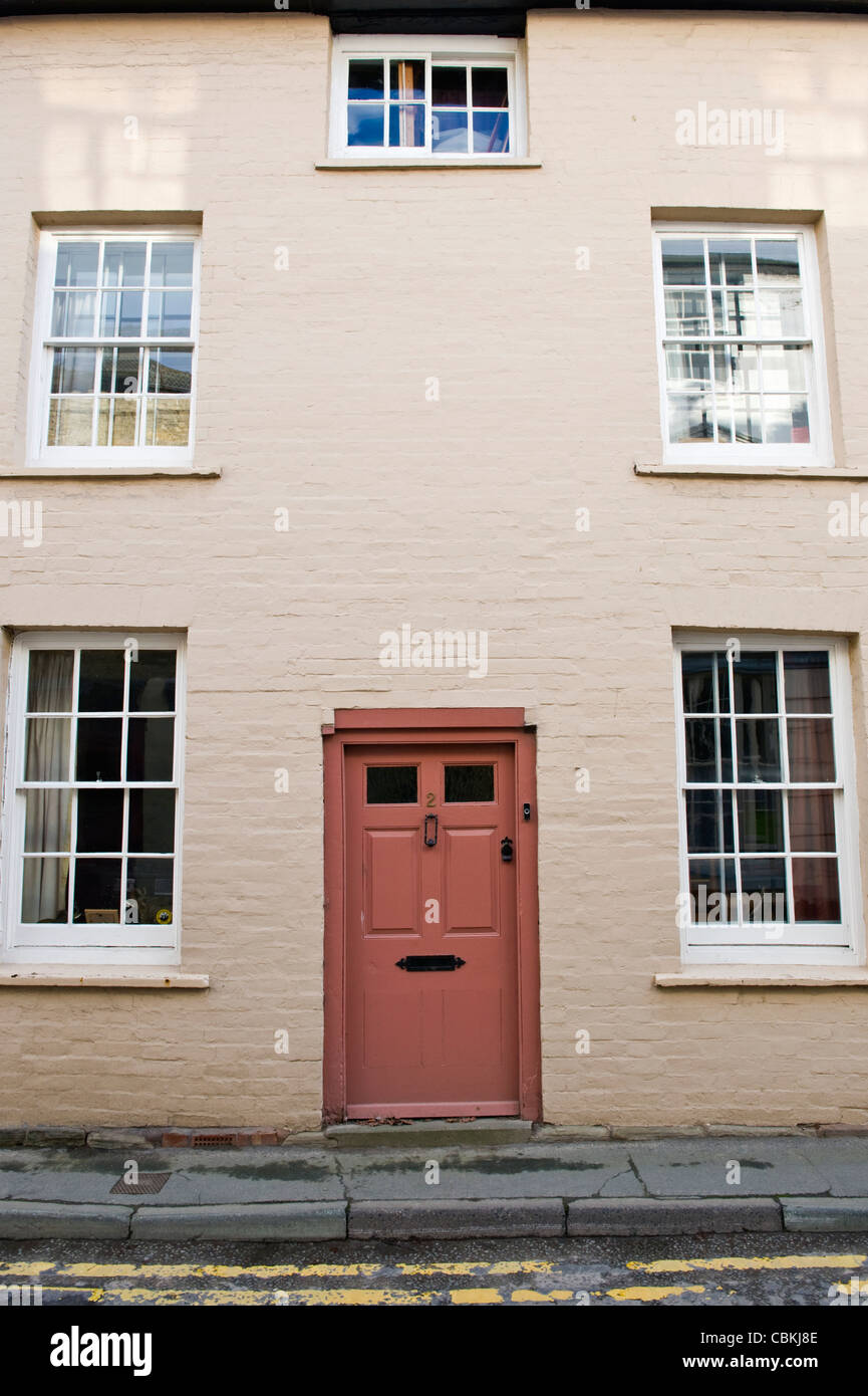 Three 3 storey period house with sash windows and brown painted front ...