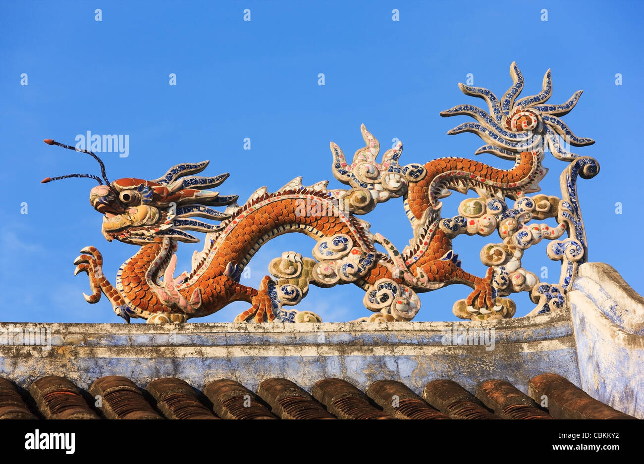 Dragon detail on temple roof, Hoi An, Quang Nam Province, Vietnam Stock ...