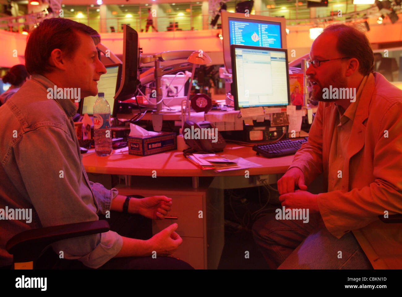 Correspondent James Bays and John Cookson in the newsroom of Al Jazeera ...