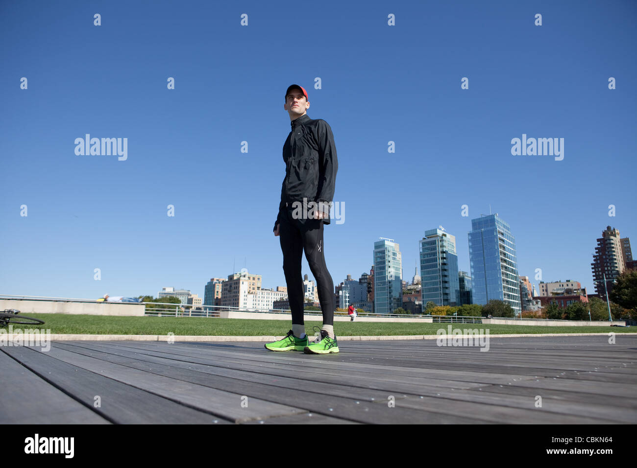 Man standing in running gear Stock Photo - Alamy