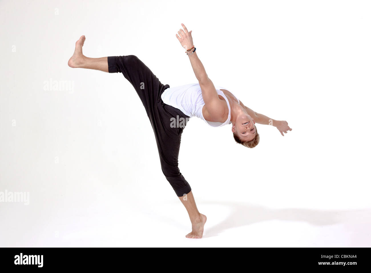 Dancer balanced with one leg raised in the air Stock Photo - Alamy