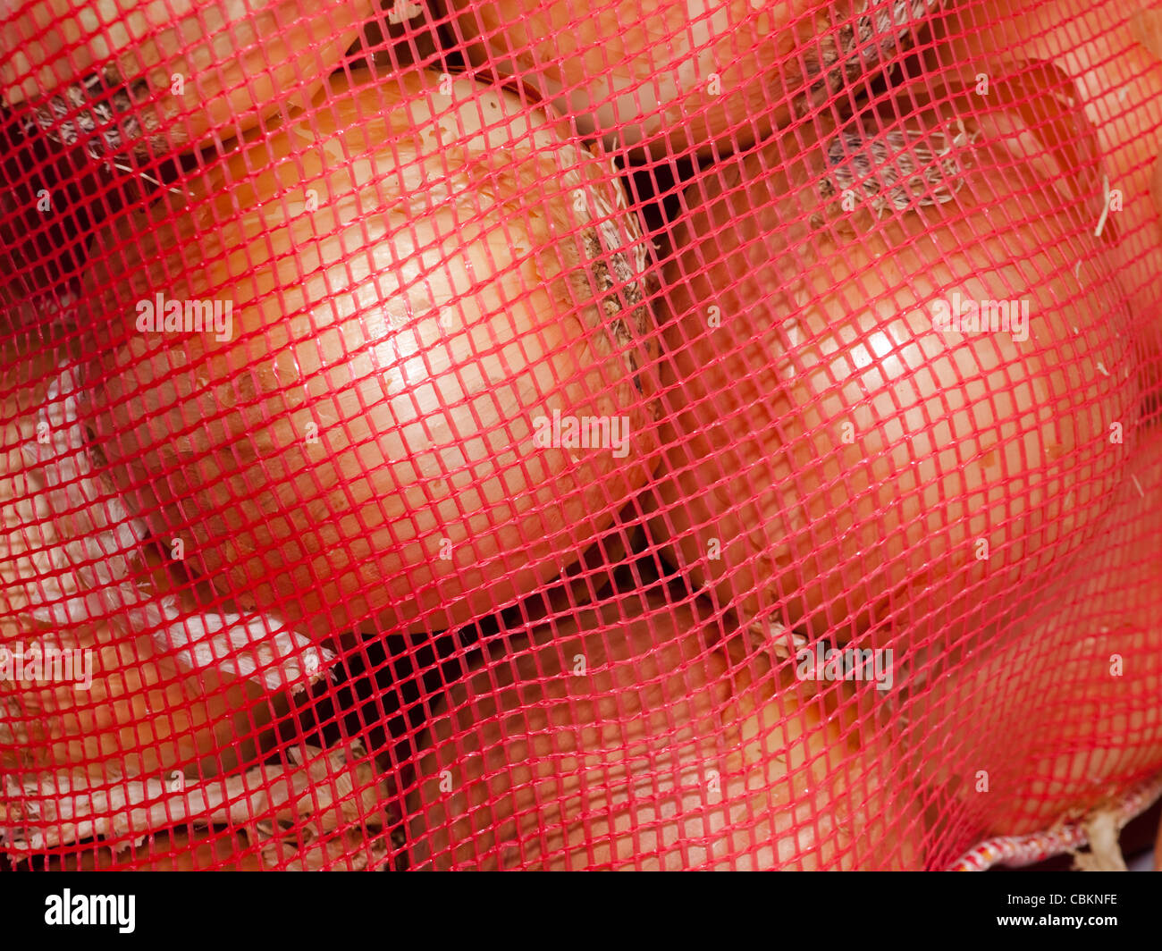 Bag of onions Stock Photo - Alamy