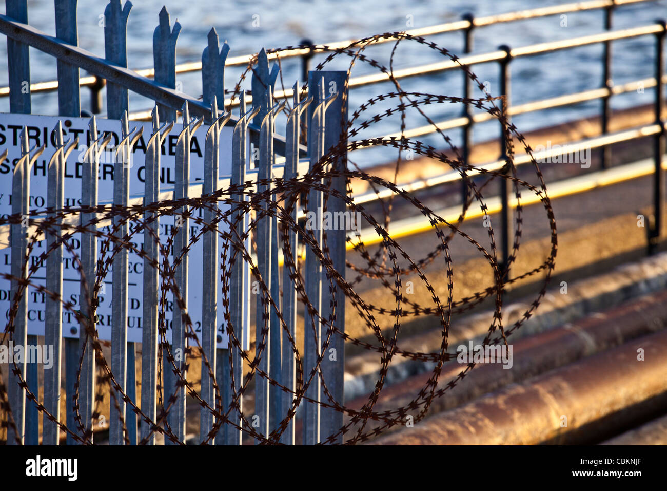 Razor Wire Protecting Chemical Discharge Wharf Stock Photo - Alamy
