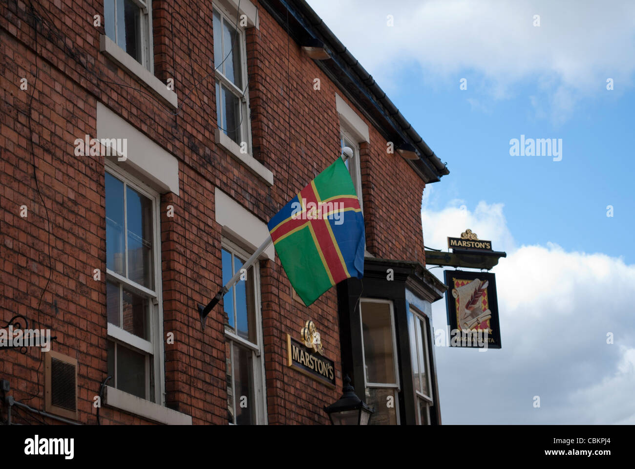 Lincolnshire flag flying from the wall of the Magna Carta pub in ...