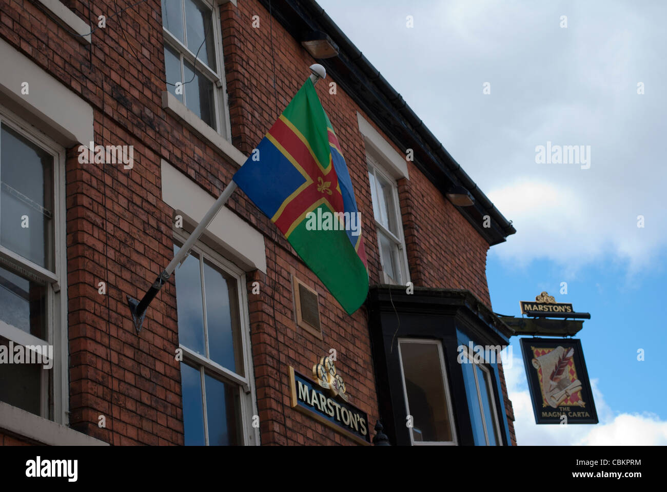 Lincolnshire flag flying from the wall of the Magna Carta pub in ...