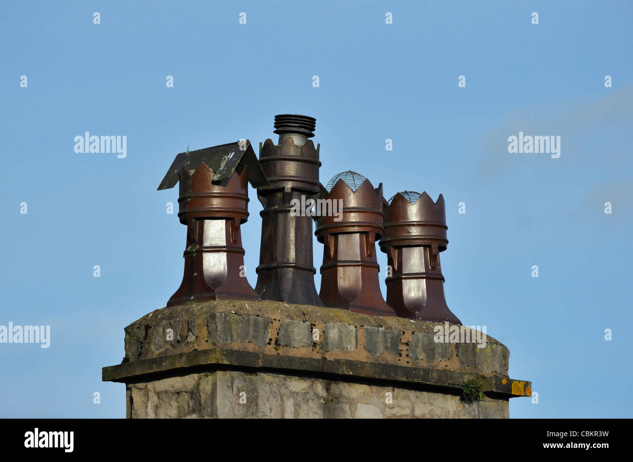 Four chimney pots on stack hi-res stock photography and images - Alamy