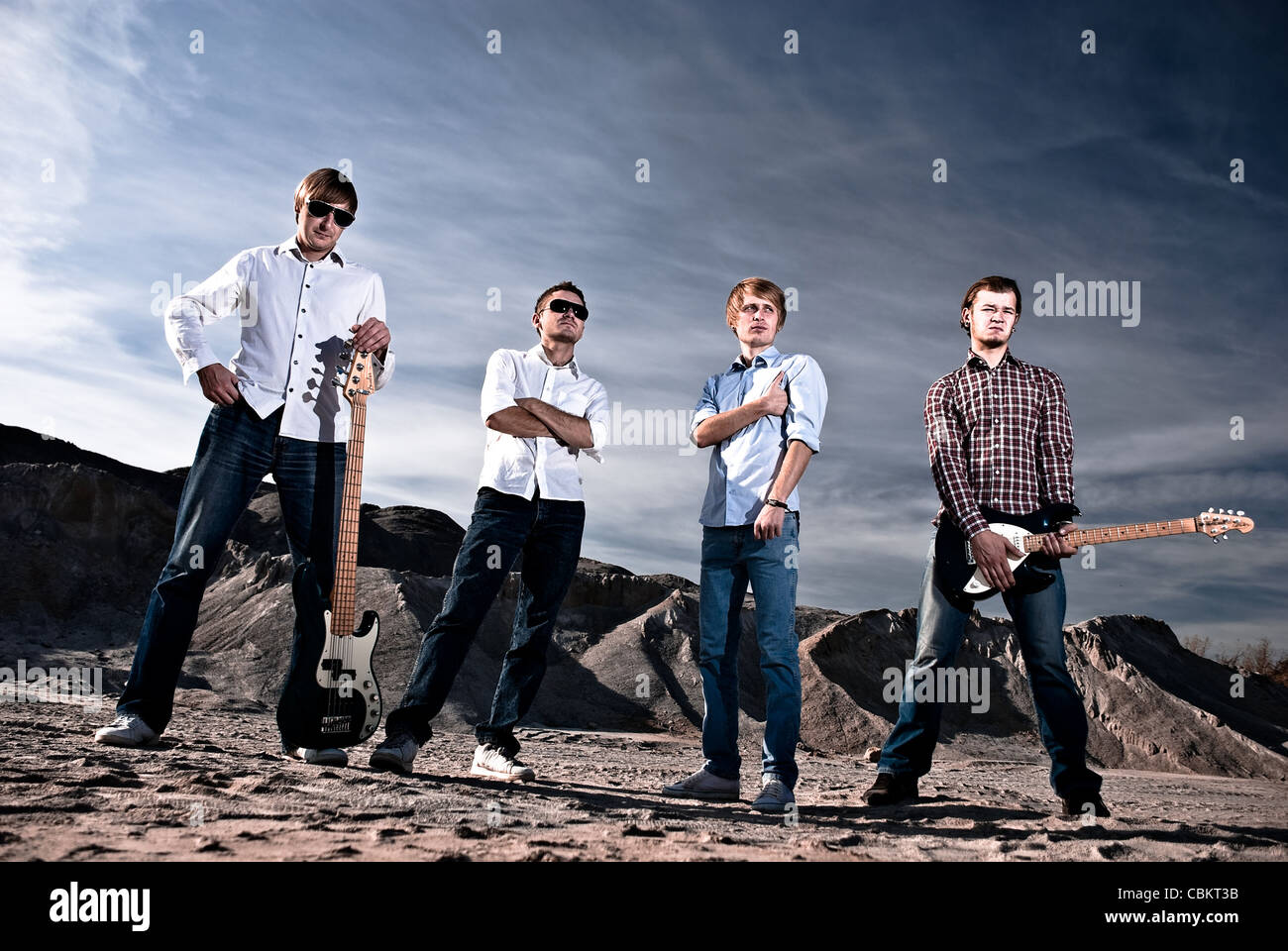 Rock on the sand Stock Photo - Alamy