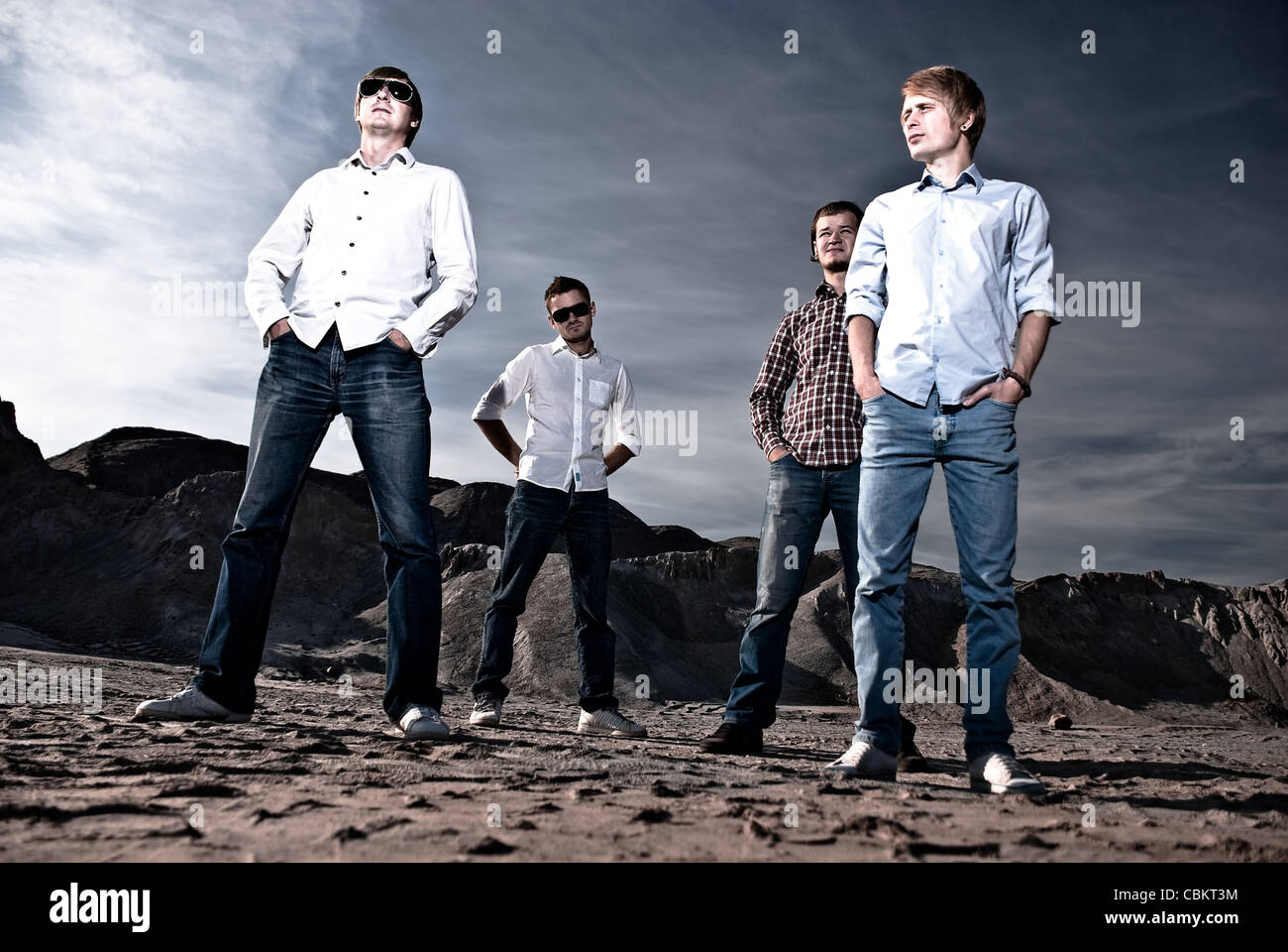 Four men outdoors Stock Photo - Alamy