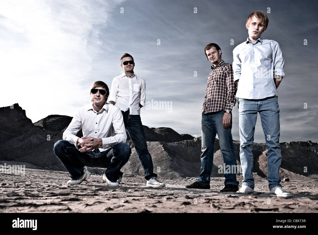 Four men outdoors Stock Photo - Alamy