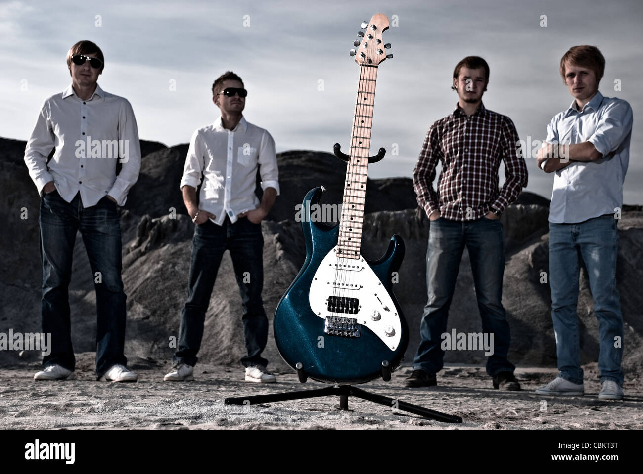 Four men look hi-res stock photography and images - Alamy