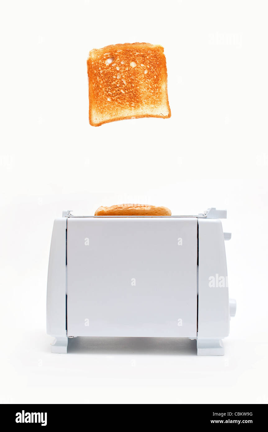 Bread Toasting device over a white background, toasted bread popping ...
