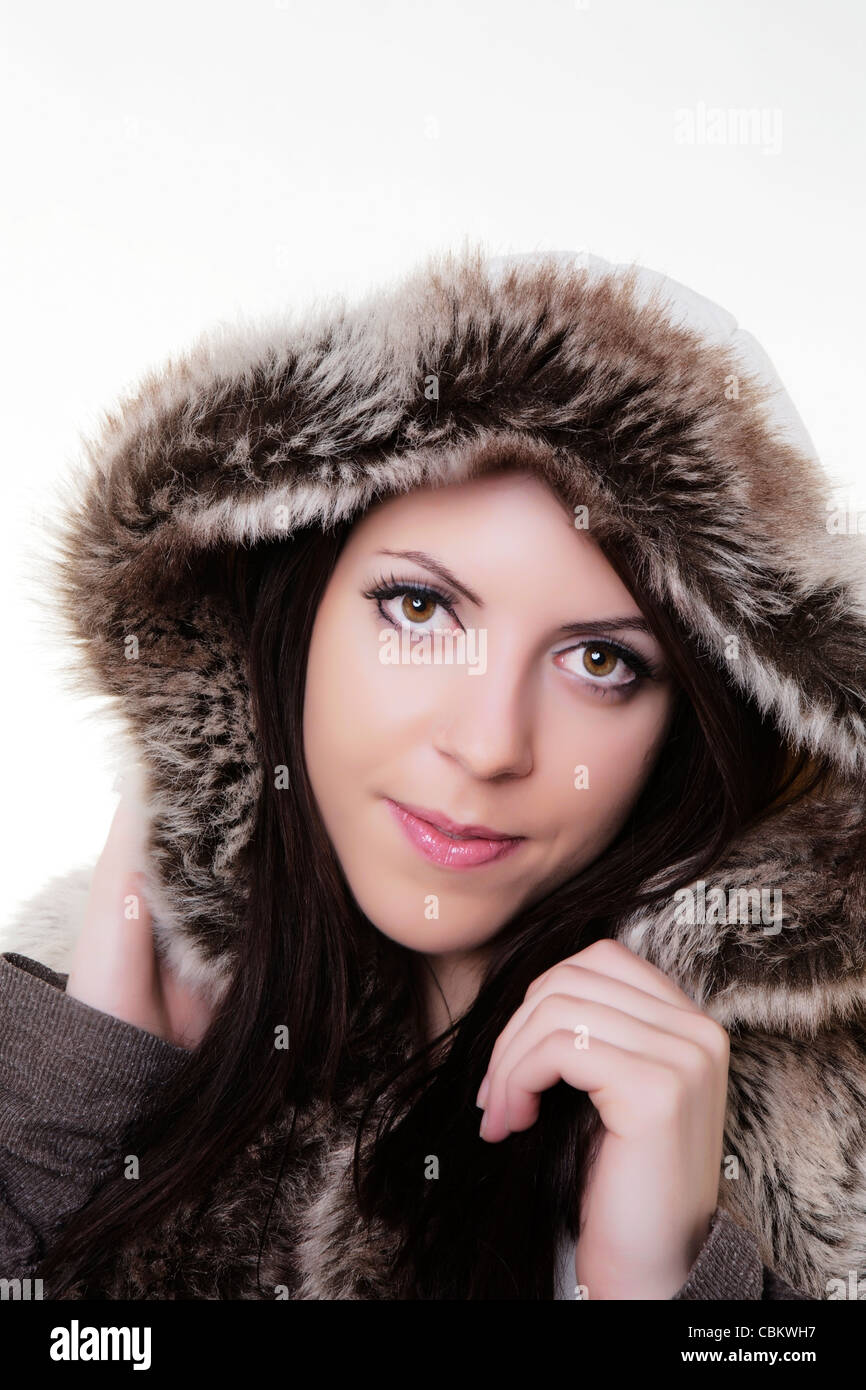 Winter woman in fur coat hood up over her head Stock Photo - Alamy