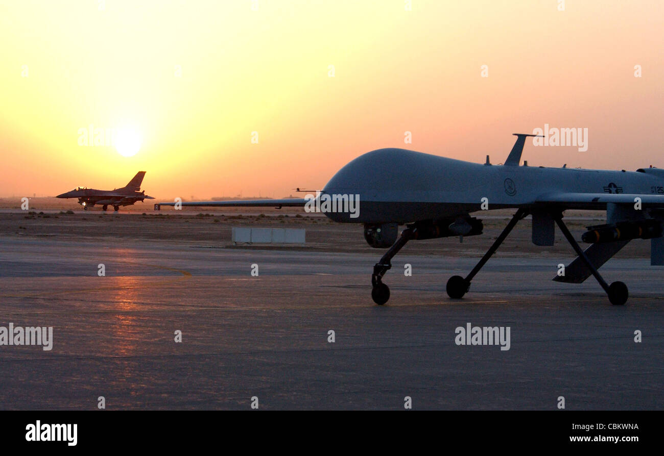 An MQ-1 Predator unmanned aerial vehicle and F-16 Fighting Falcon ...