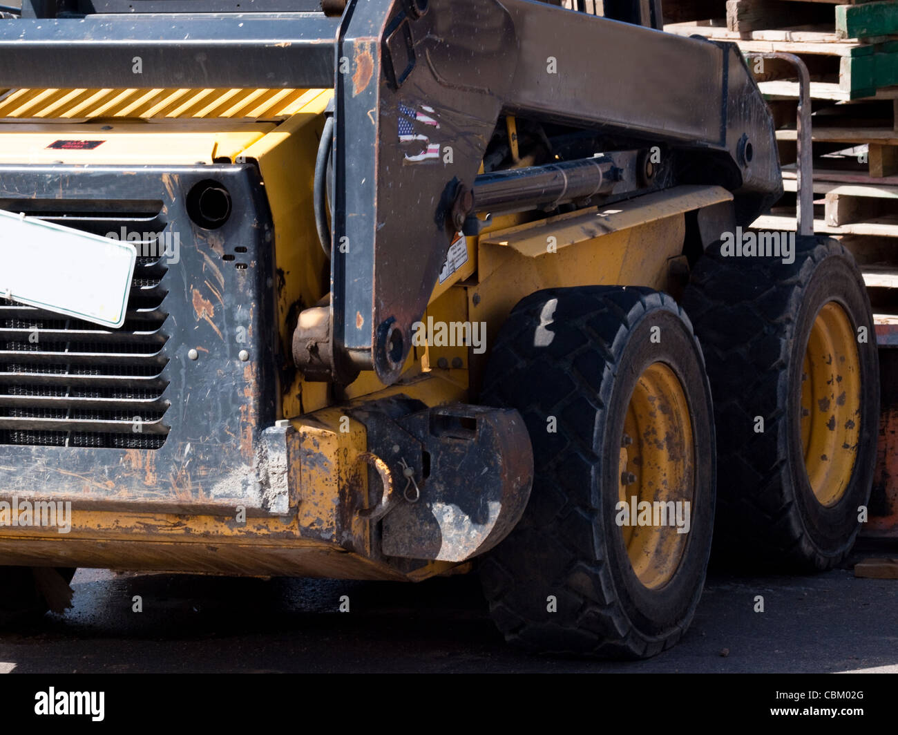 Skid steer loader Stock Photo - Alamy