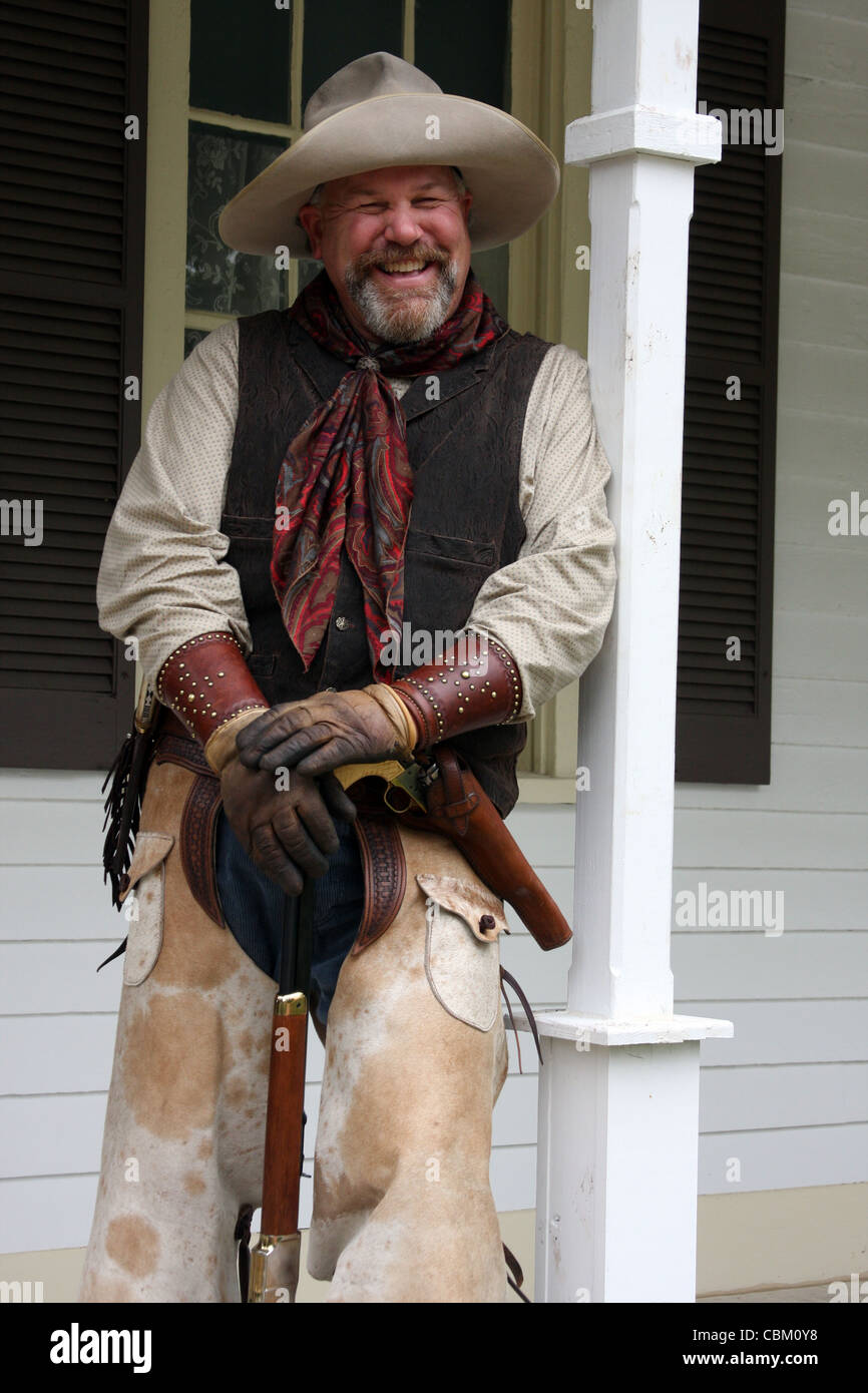A vintage laughing cowboy Stock Photo - Alamy
