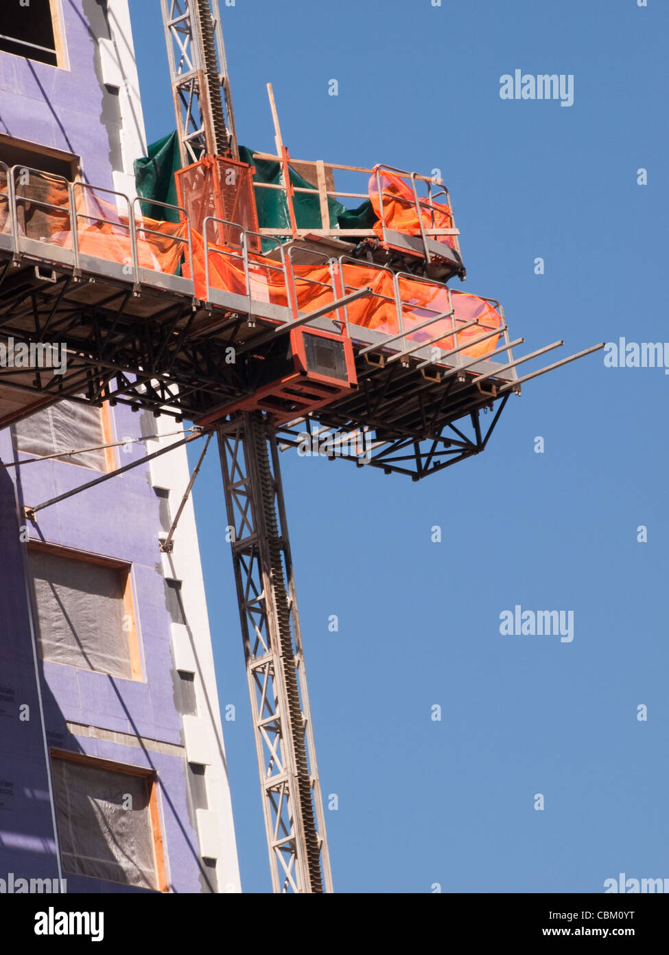 Construction site of high rise with scaffolding Stock Photo - Alamy