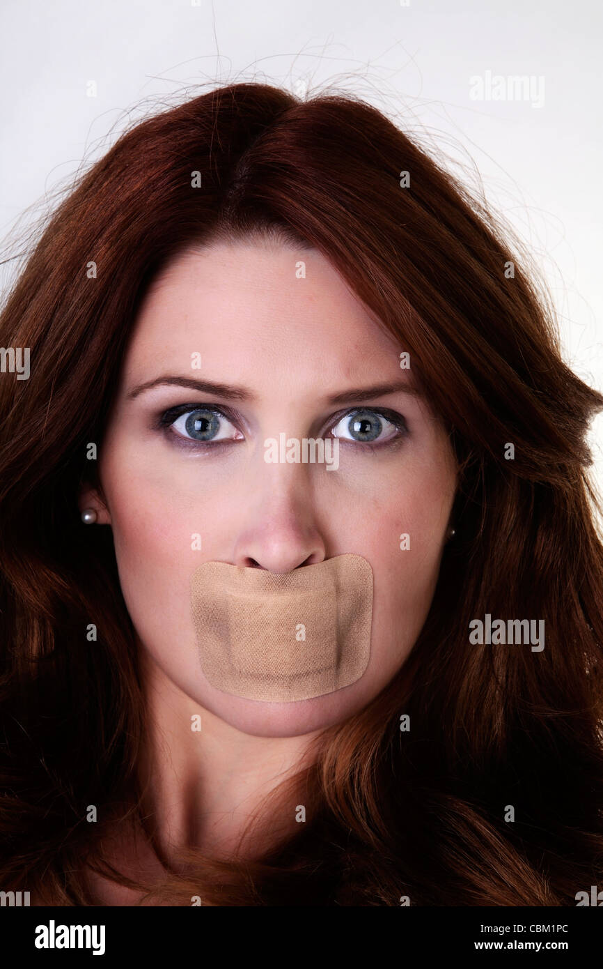 woman with a large plaster on her face Stock Photo - Alamy