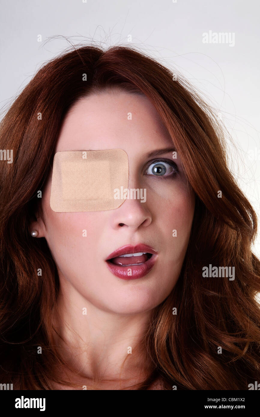 woman with a large plaster on her face Stock Photo - Alamy